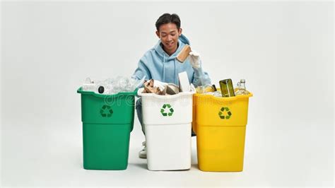 Asian Man Wear Gloves Sort Garbage In Dustbins Stock Image Image Of Recycle Background 265612087