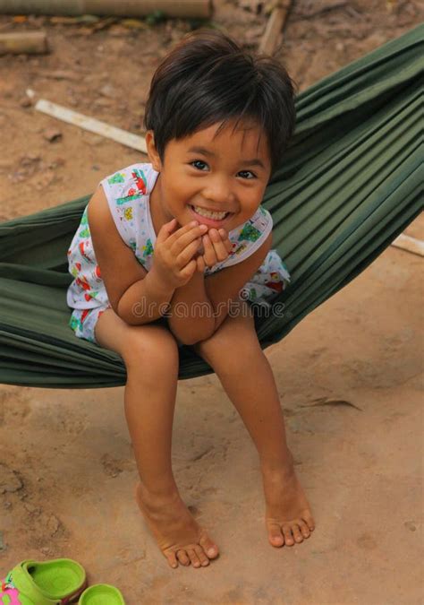 Little Smiling Asian Girl Swing In Hammock Editorial Stock Image