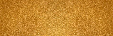 금빛 반짝이는 질감 반짝이는 종이 배경 반짝이는 황금빛이 반짝이는 추상 배너 크리스마스 휴가를 위한 조명의 초점이 흐려집니다 플랫 레이 모형 디자인 반짝이에 대한 스톡 사진