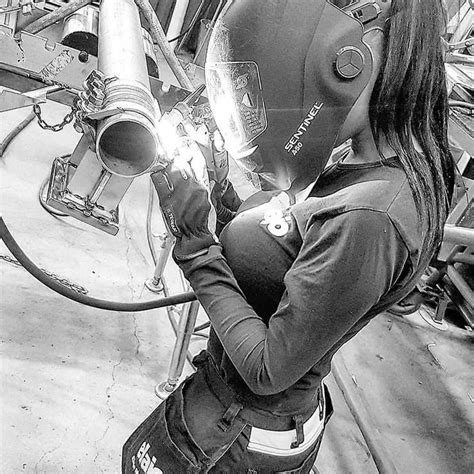Woman Welder In Action