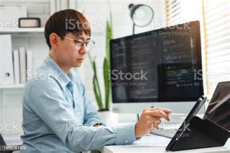 Developing Programmer Development Website Design And Coding Technologies Working At Home Stock