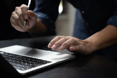 Close Up Man Working And Typing On Laptop Computer Keyboard Work From Home Office Teleworking