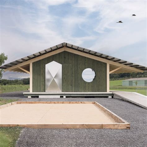 Mjma Architecture And Design Marries Wood And Mesh For Sports Centre Mjma Architecture And Design Marries Wood And Mesh For Sports Centre