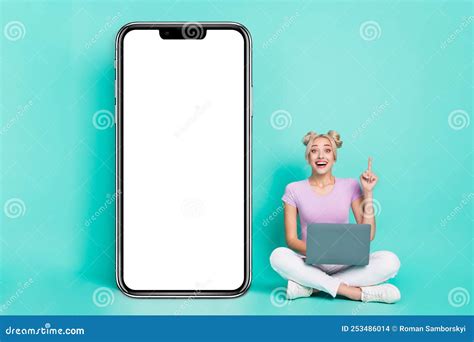 Portrait Of Attractive Trendy Cheery Girl Using Laptop Pointing Up Copy Space Isolated On Teal