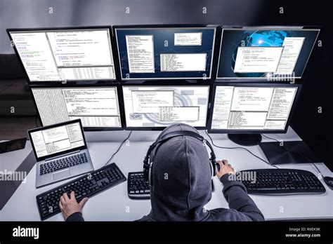 Hacker Stealing Information From Multiple Computers Stock Photo Alamy