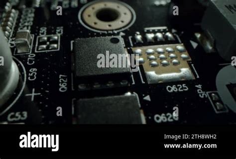 Macro Dolly Shot Side View Of A Computer Electrical Circuit With Cip
