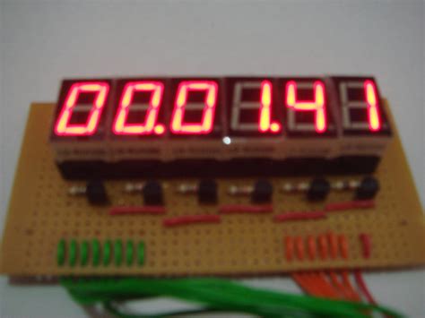 Digital Clock Using 7 Segment Display Controlled Using Tv Remote 12