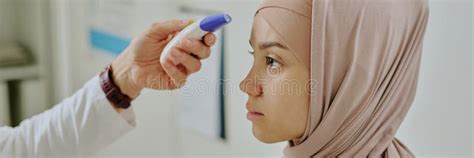 Measuring Temperature Using Infrared Thermometer Stock Image Image Of Clinic Nurse 336396331