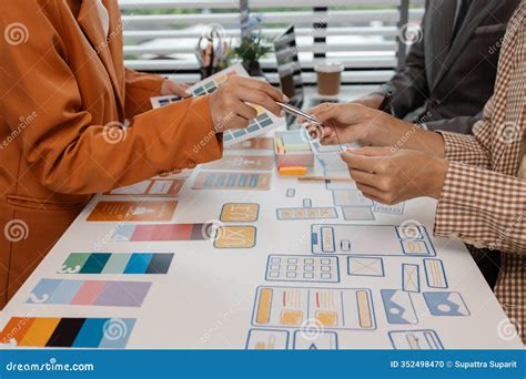 ux developer and ui designer presenting mobile app interface design on