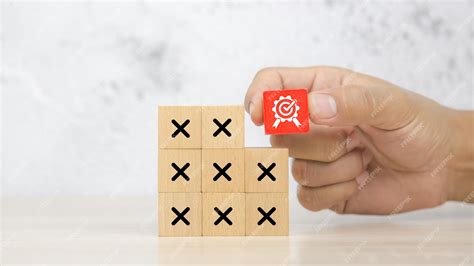 Premium Photo Hand Choose Wooden Block Stack With Check Mark Quality