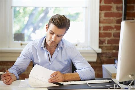 Man Working At Desk In Contemporary Office Stock Image Image Of Cool