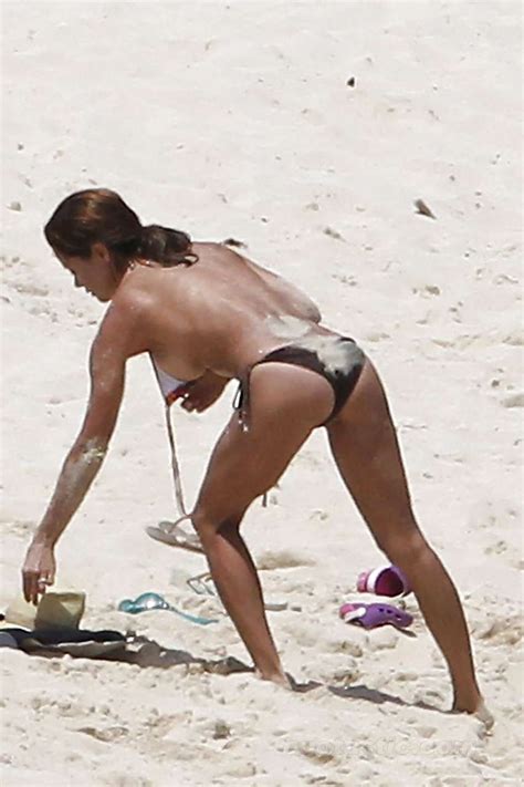 Brooke Burke Showing Her Great Body In Various Bikini And Almost