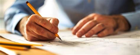 Architects Hands Finetuning Detailed Blueprints On Table Precision