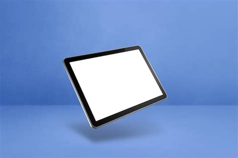 Computadora Flotante Tablet Pc Aislada Sobre Fondo Horizontal Azul Foto Premium