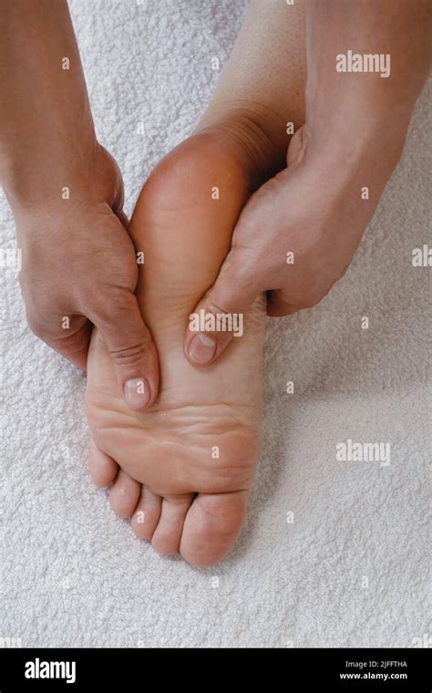 Foot Spa Massage Treatment By Professional Massage Therapist In Spa Resort Wellness Stress