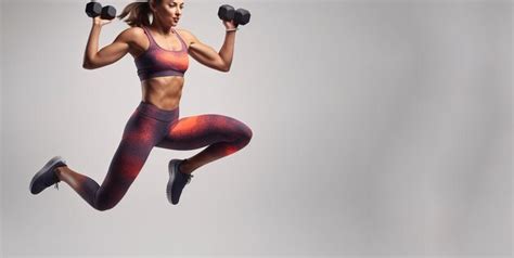 Athletic Woman Jumping With Dumbbells Ai Generated Premium Ai