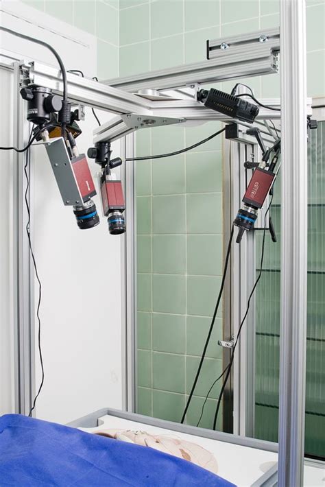 Efficient Physics Based Tracking Of Heart Surface Motion For Beating Heart Surgery Robotic Systems