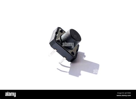 A Close Up Portrait Of A Small Push Button The Electric Component Is Used In Electronics On A