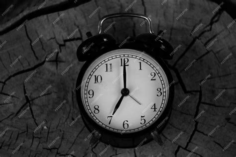 Premium Photo High Angle View Of Clock On Table