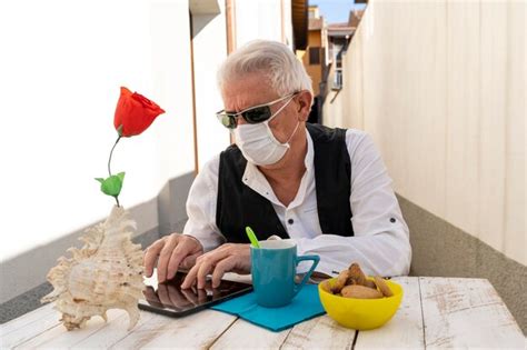 Premium Photo Man Sitting On Table