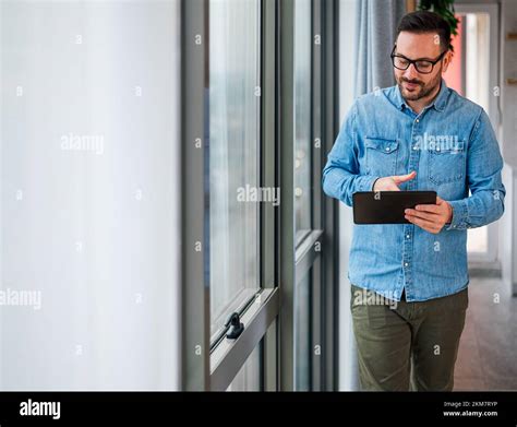 Smart Adult Male Programmer Contacting His Coworkers About A Bug In Smart Adult Male Programmer Contacting His Coworkers About A Bug In