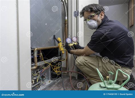 Hvac Repairman Charging Ac Unit Stock Image Image Of Virus Person 179458199