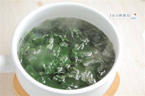 J A