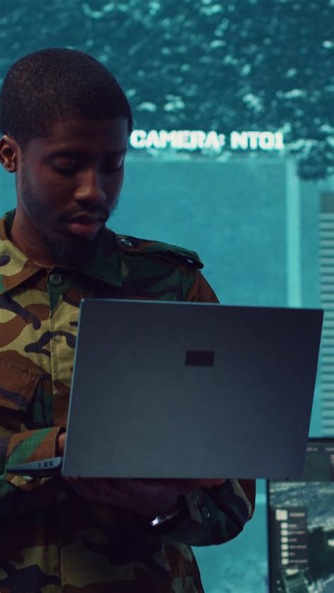 Vertical National Guard Machinist Managing Cybersecurity Measures To Protect Federal Government