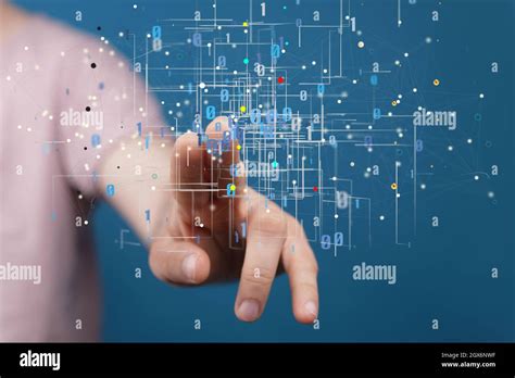 man tapping on a hologram of binary codes digital transformation