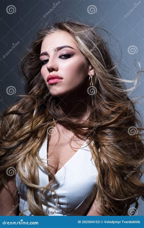 Girl With Long And Shiny Wavy Hair Beautiful Woman Model With Curly