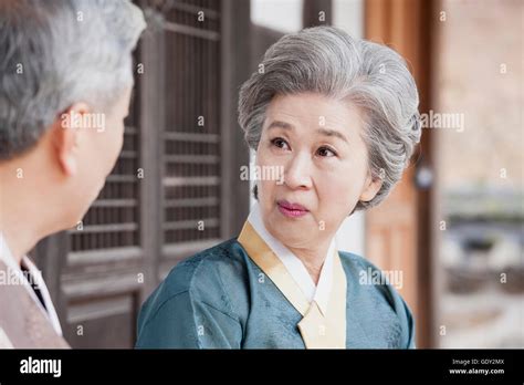 Portrait Of Old Surprised Korean Woman Looking At Old Man Stock Photo Alamy
