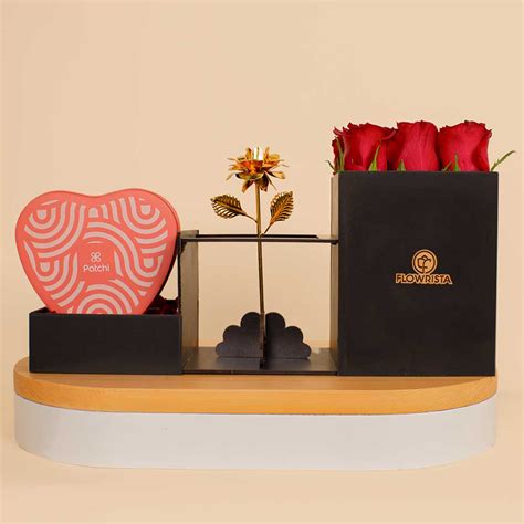 Patchi Tin Box Of 22 Pieces And 9 Red Roses