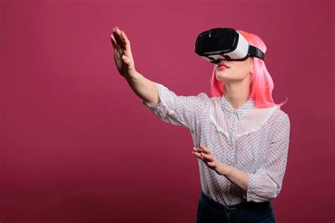 Free Photo Portrait Of Happy Adult With Pink Hair Playing With Vr