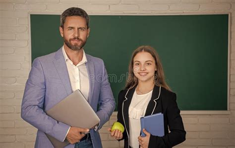Happy Girl With Man Teacher In Classroom Education Stock Image Image Of Webinar Girl 313487501