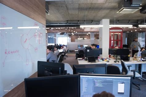 Premium Photo Software Developers Writing Programming Code On Computer