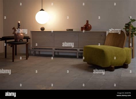 interior design of cozy living room with stylish sofa coffee table dired flowers in vase stock