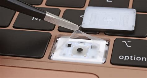MacBook Air Teardown Confirms Improving Repairability With Adhesive Pull Tabs Under Battery