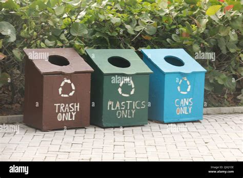 Three Trash Bins For Different Types Of Garbage In The Streets Stock Photo Alamy