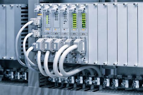 Premium Photo View Of Communication Port Module On PLC Unit In Control Box Of Automation Machine
