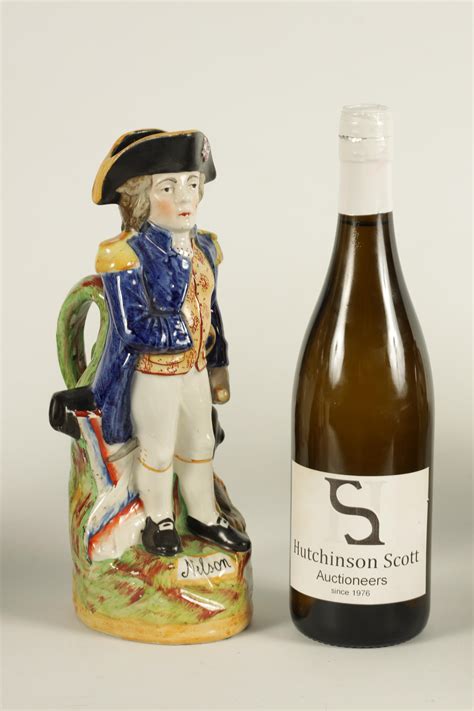 Lot 71 A 19th Century Polychrome Figural Toby Jug