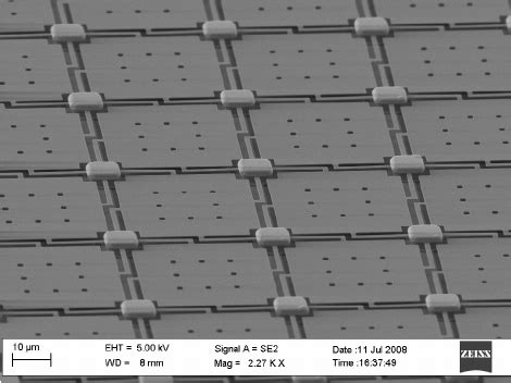 SEM Picture Of A Section Of The Fabricated Micro Mirror Array With Download Scientific Diagram
