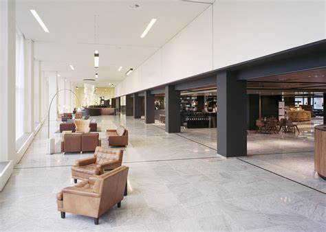 Powerhouse Remodels Rotterdam Office Foyer To Resemble A Hotel Lobby