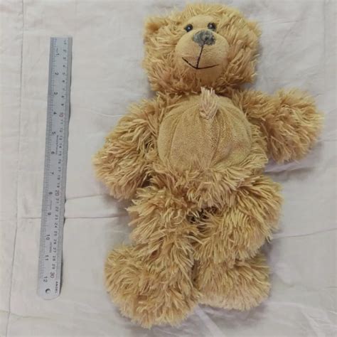 کمدا قیمت و خرید عروسک خرس رنگ قهوه ای