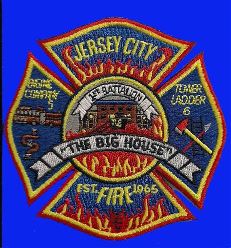 A Fire Department Patch With The Words Jersey City And The Big House On It
