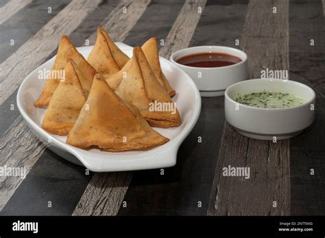 Potato Samosa Snacks On Textured Background Indian Ramadan Food