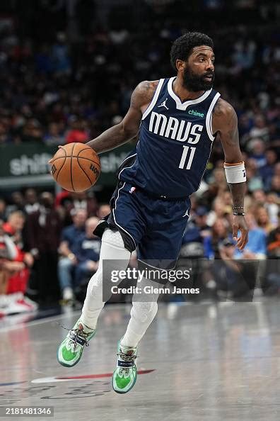 Kyrie Irving Of The Dallas Mavericks Dribbles The Ball During The
