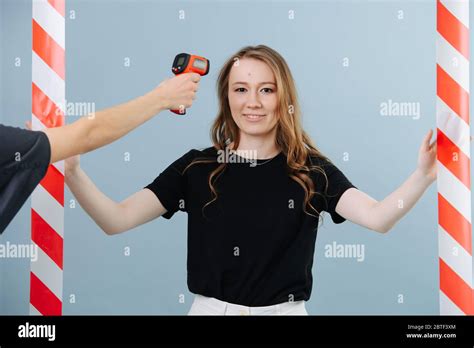 Staff Are Checking The Temperature At Control Point Stock Photo Alamy
