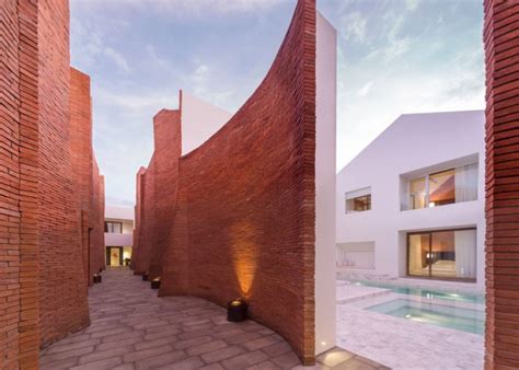 Fluted Brick Walls Frame Views Above Boutique Thailand Hotel