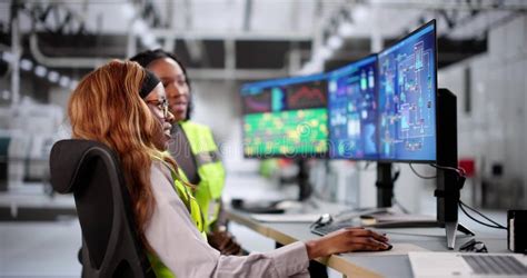 Female Engineer Operating Scada System At Industrial Plant Stock Image
