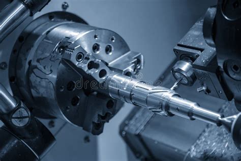 The CNC Lathe Machine Cutting The Steel Shaft Stock Image Image Of Metal Chuck